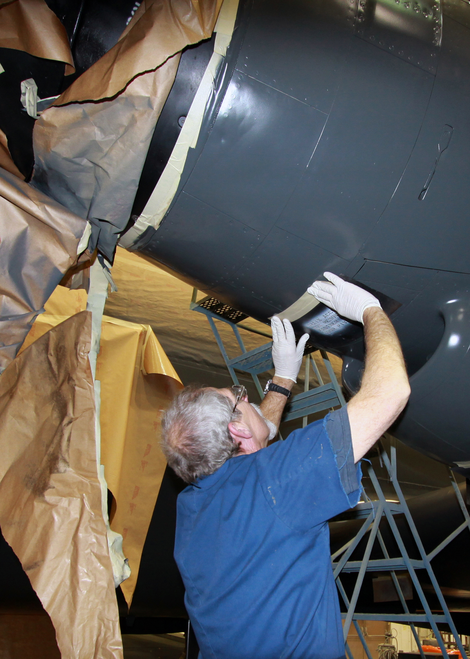 FRCSE painters create living history on aircraft for Naval centennial ...